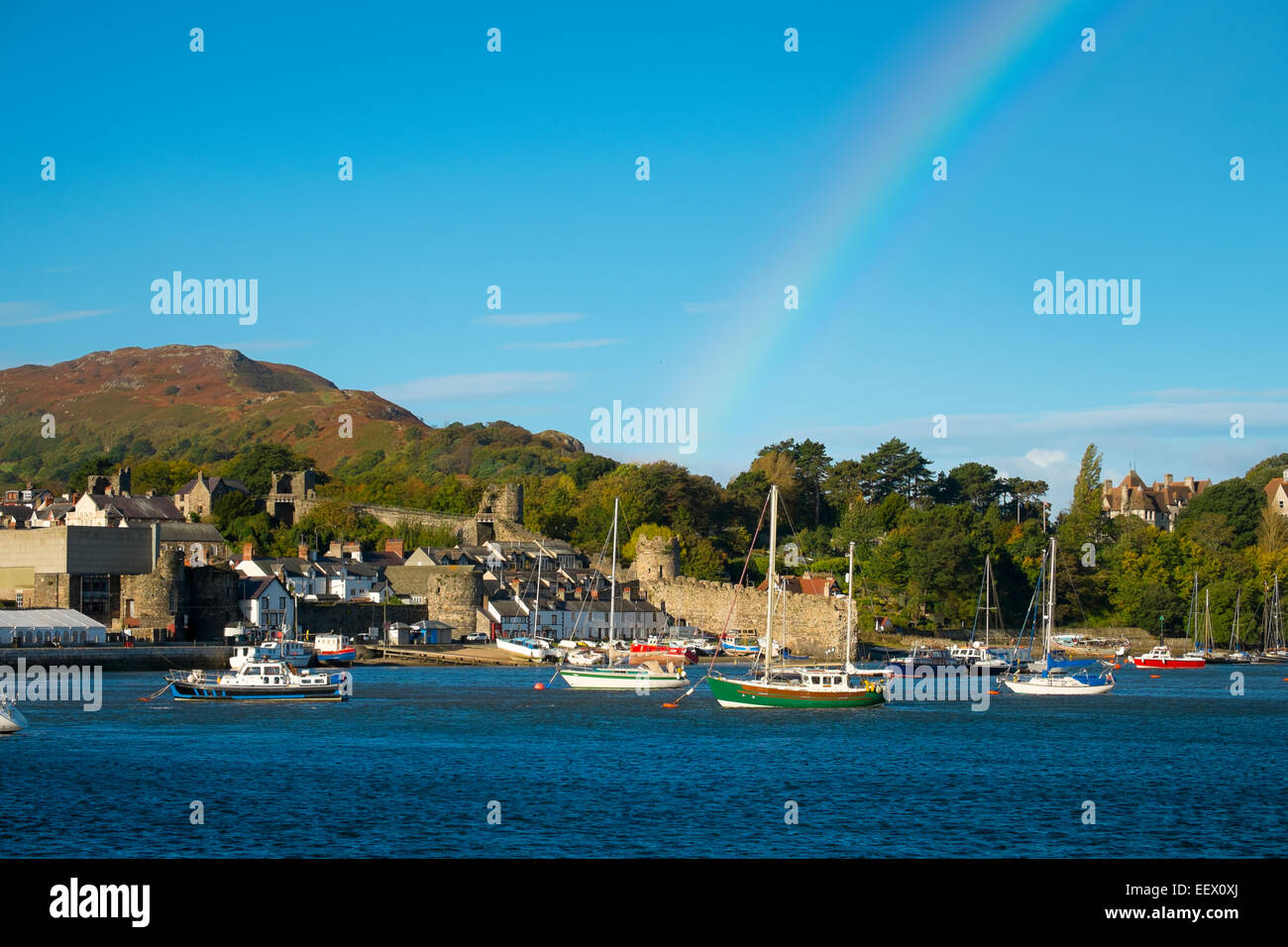 Rainbow over Conwy bay and town walls, Wales, UK Stock Photo - Alamy