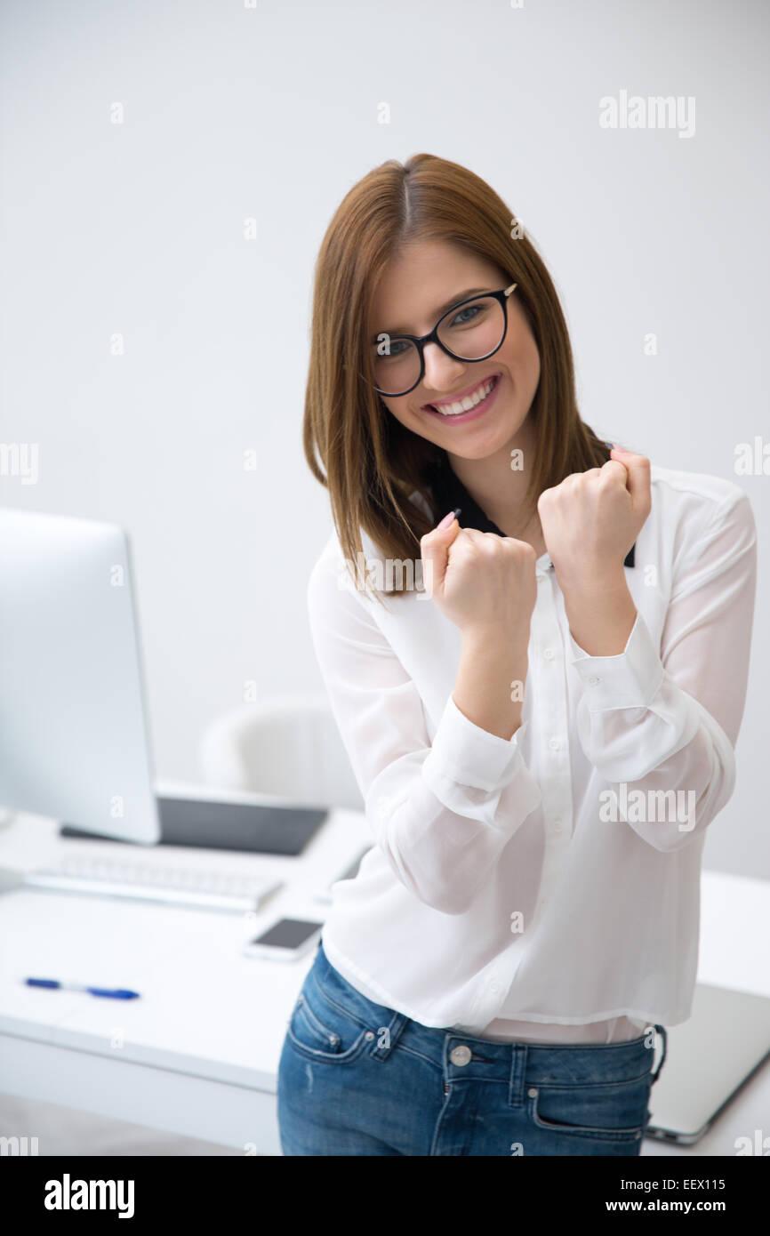 Woman arms raised desk hi-res stock photography and images - Alamy