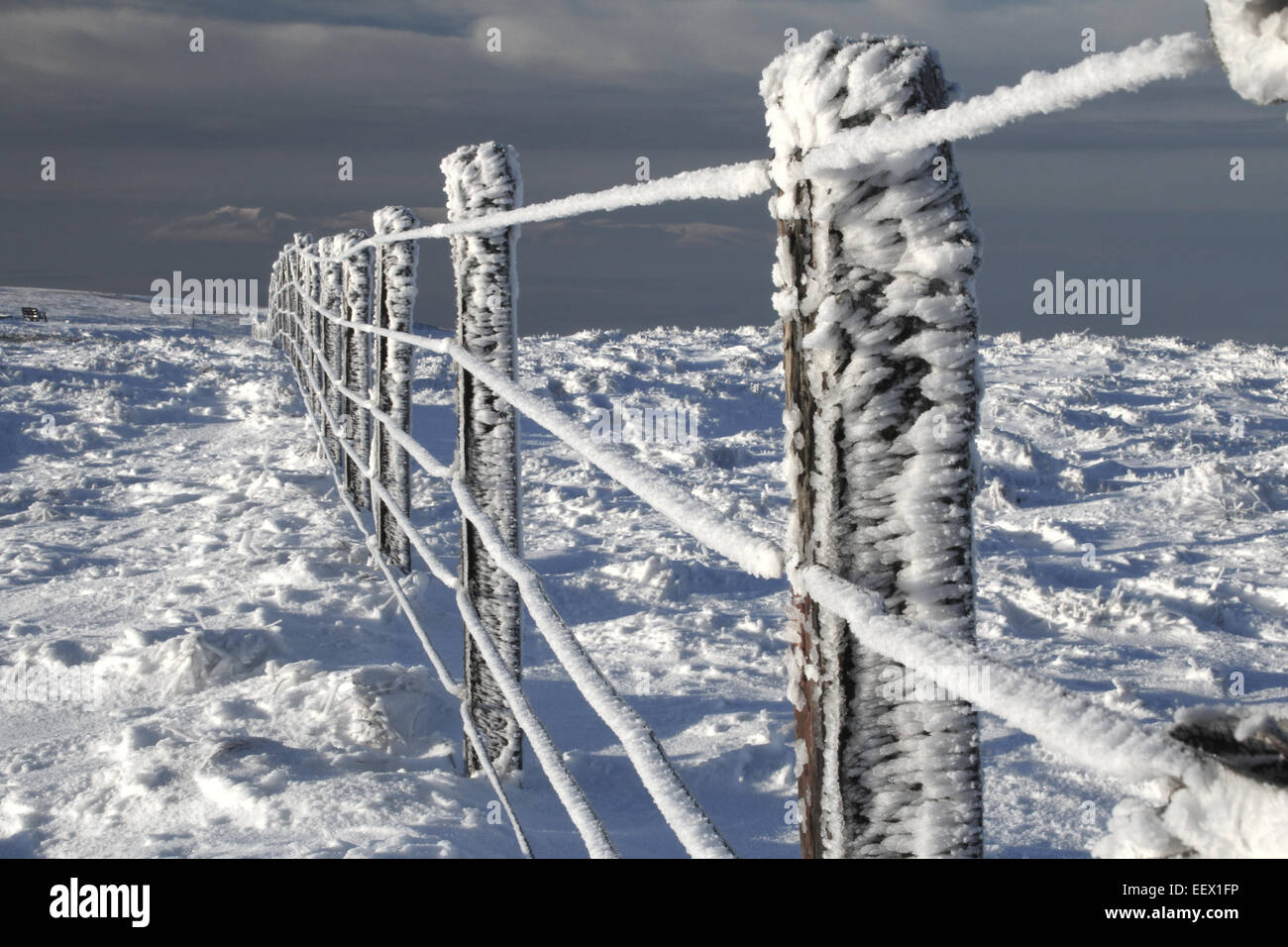 frozen fence on Hartside with Blencathra in the distance Stock Photo ...