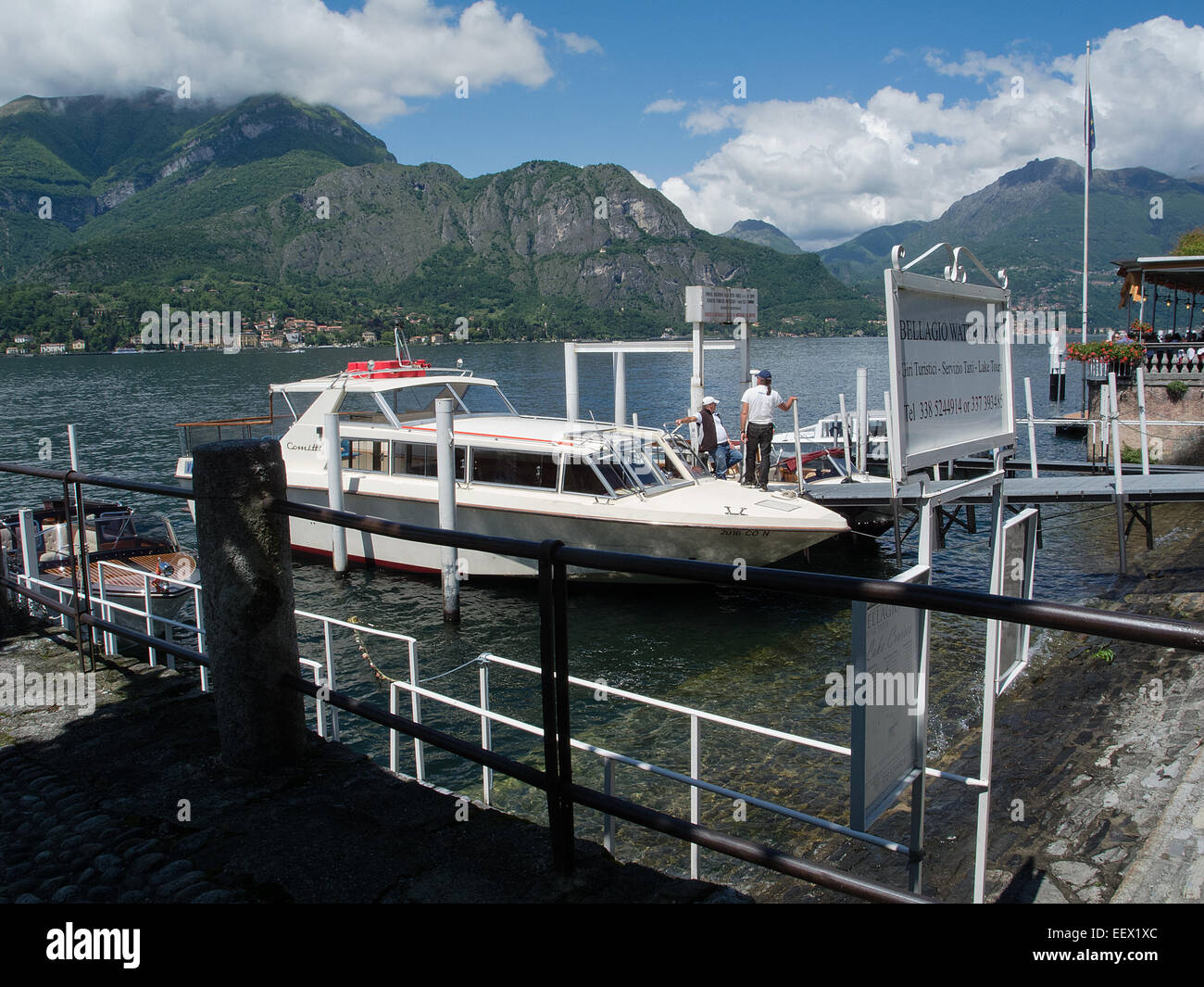 Water Taxis at the jetty in Bellagio on Lake Como in Italy with a view ...