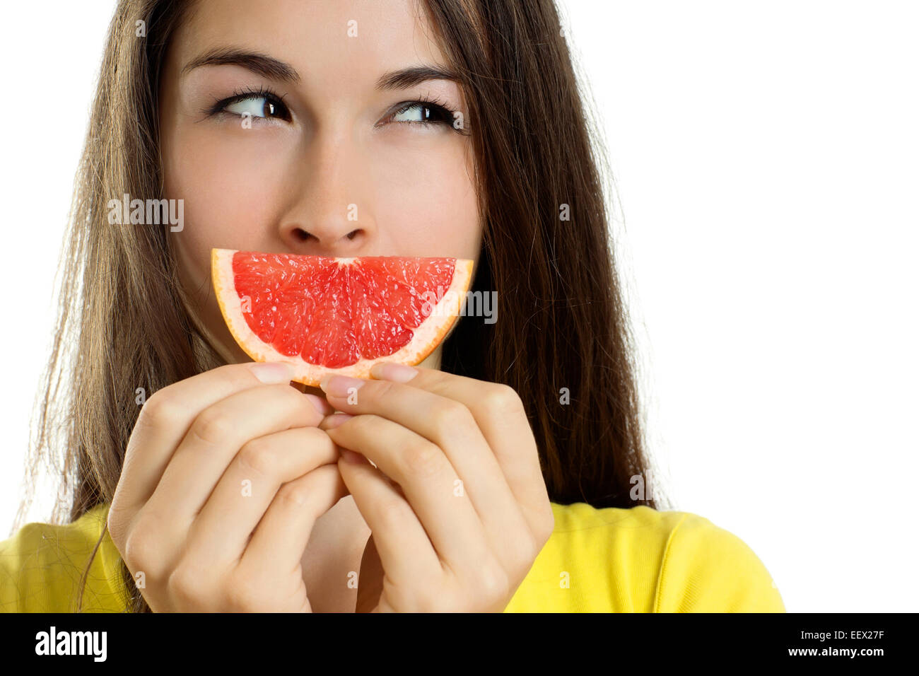 Beautiful young happy woman with fruit Stock Photo - Alamy