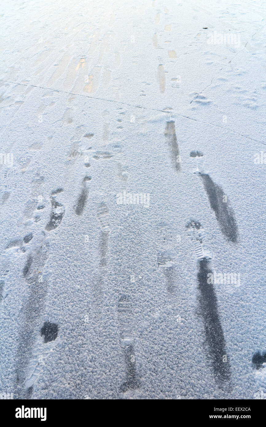 Footprints on the ice Stock Photo - Alamy