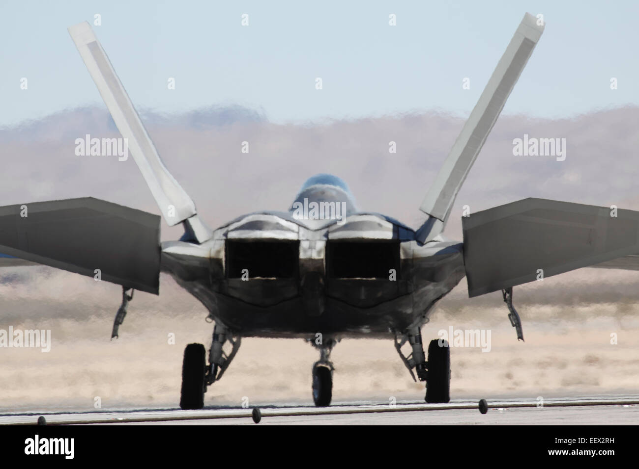 an F-22 fighter jet of the United States Air Force prepares to take off ...