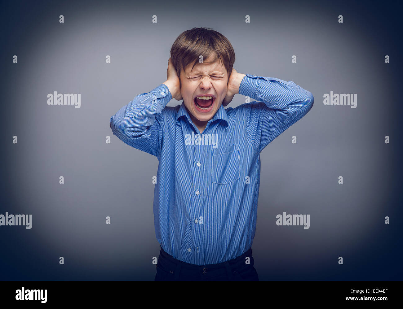 Child covering ears loud hi-res stock photography and images - Alamy