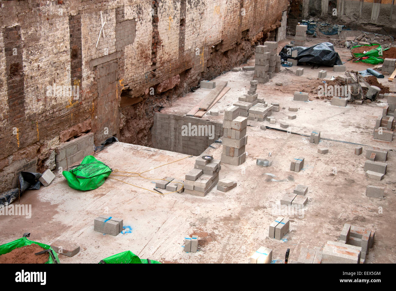 Digging foundations new old building deep build Stock Photo - Alamy