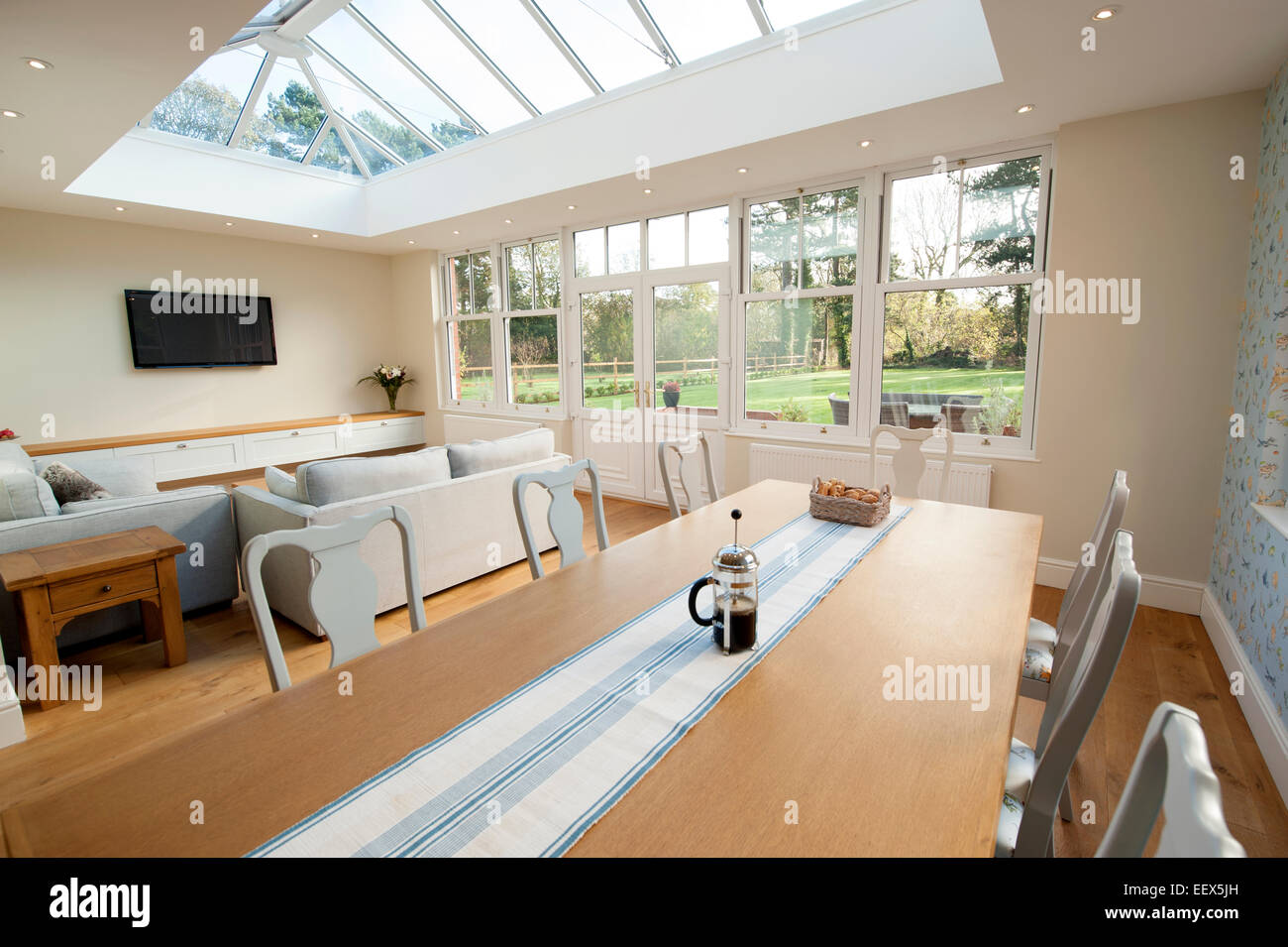 Modern glass conservatory breakfast room extension Stock Photo - Alamy
