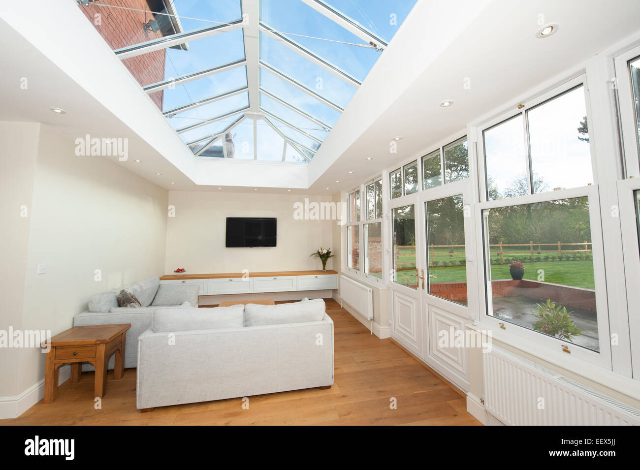 Modern glass conservatory breakfast room extension Stock Photo - Alamy