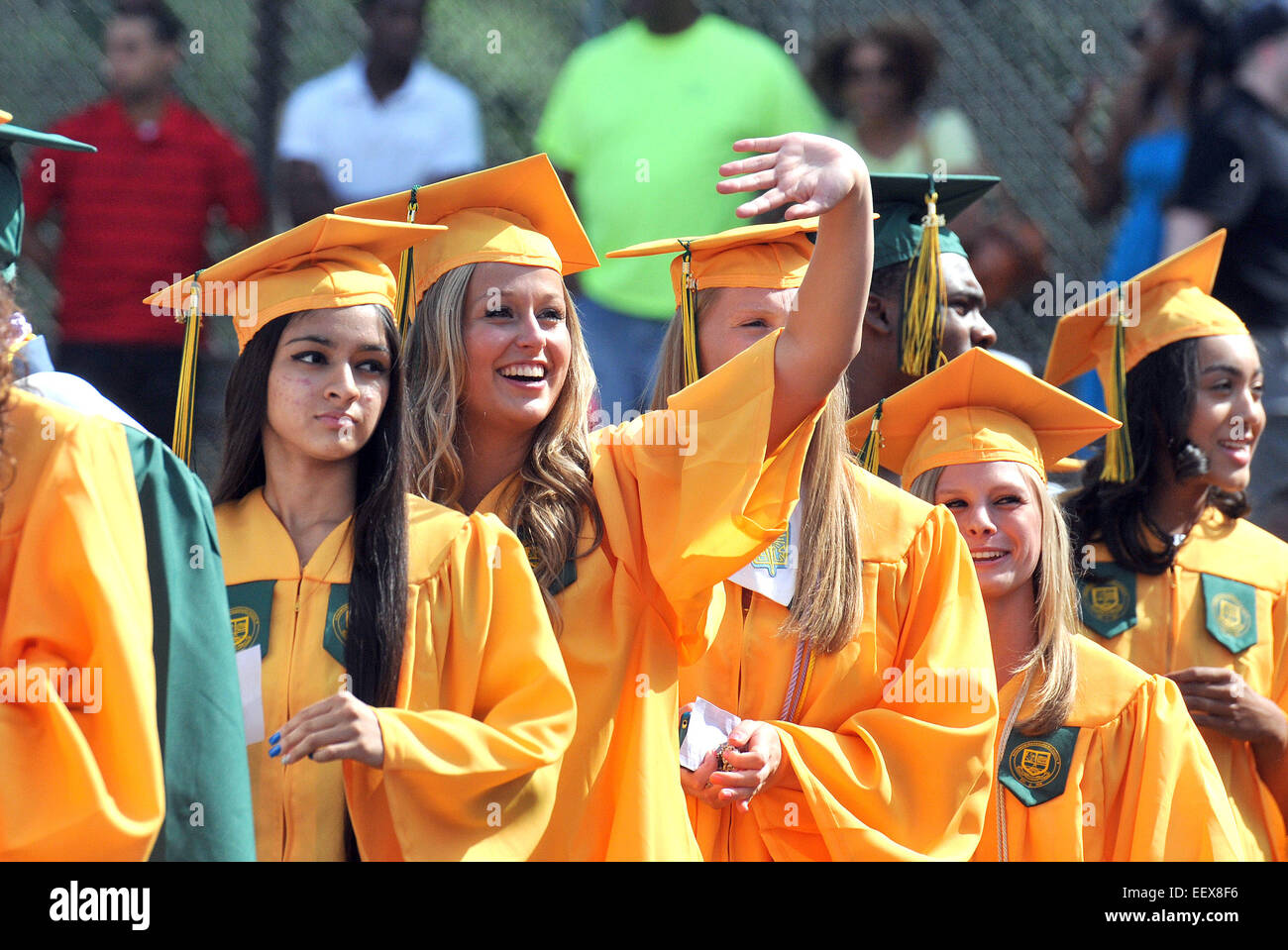 Graduation wave smile happy graduate hi-res stock photography and ...