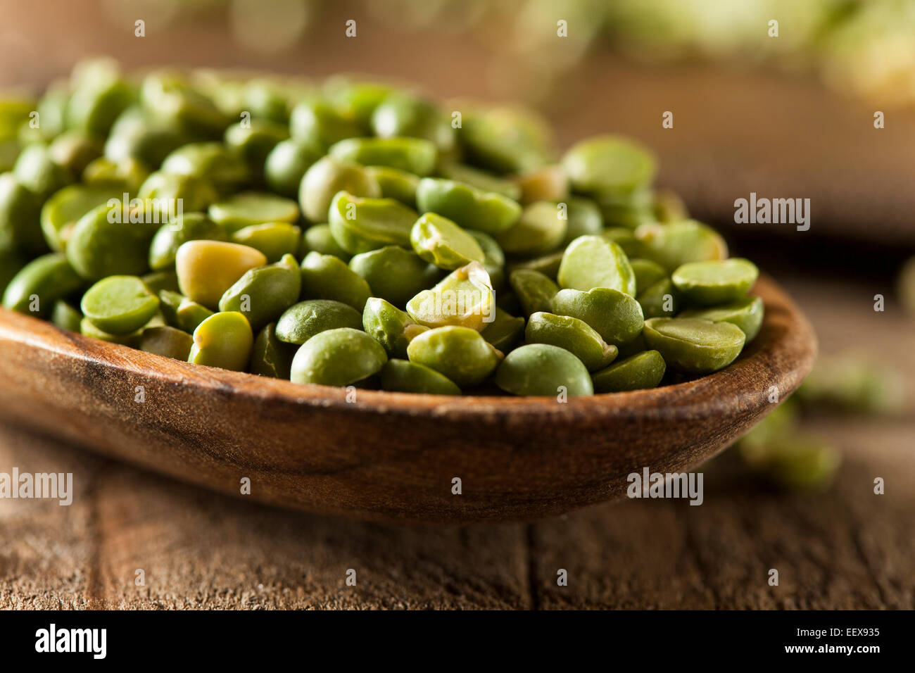 Raw Organic Green Split Peas in a Spoon Stock Photo - Alamy