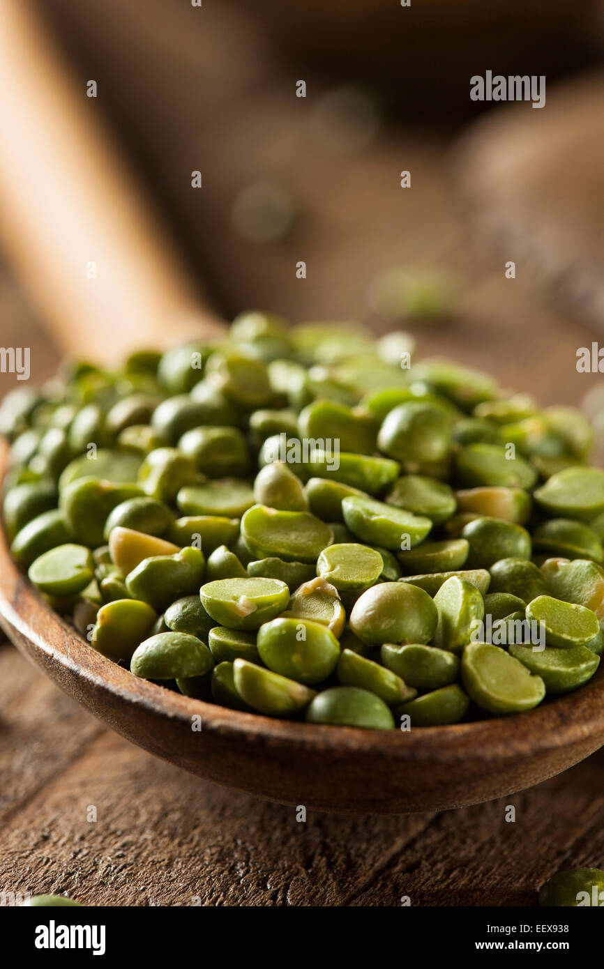 Raw Organic Green Split Peas in a Spoon Stock Photo - Alamy