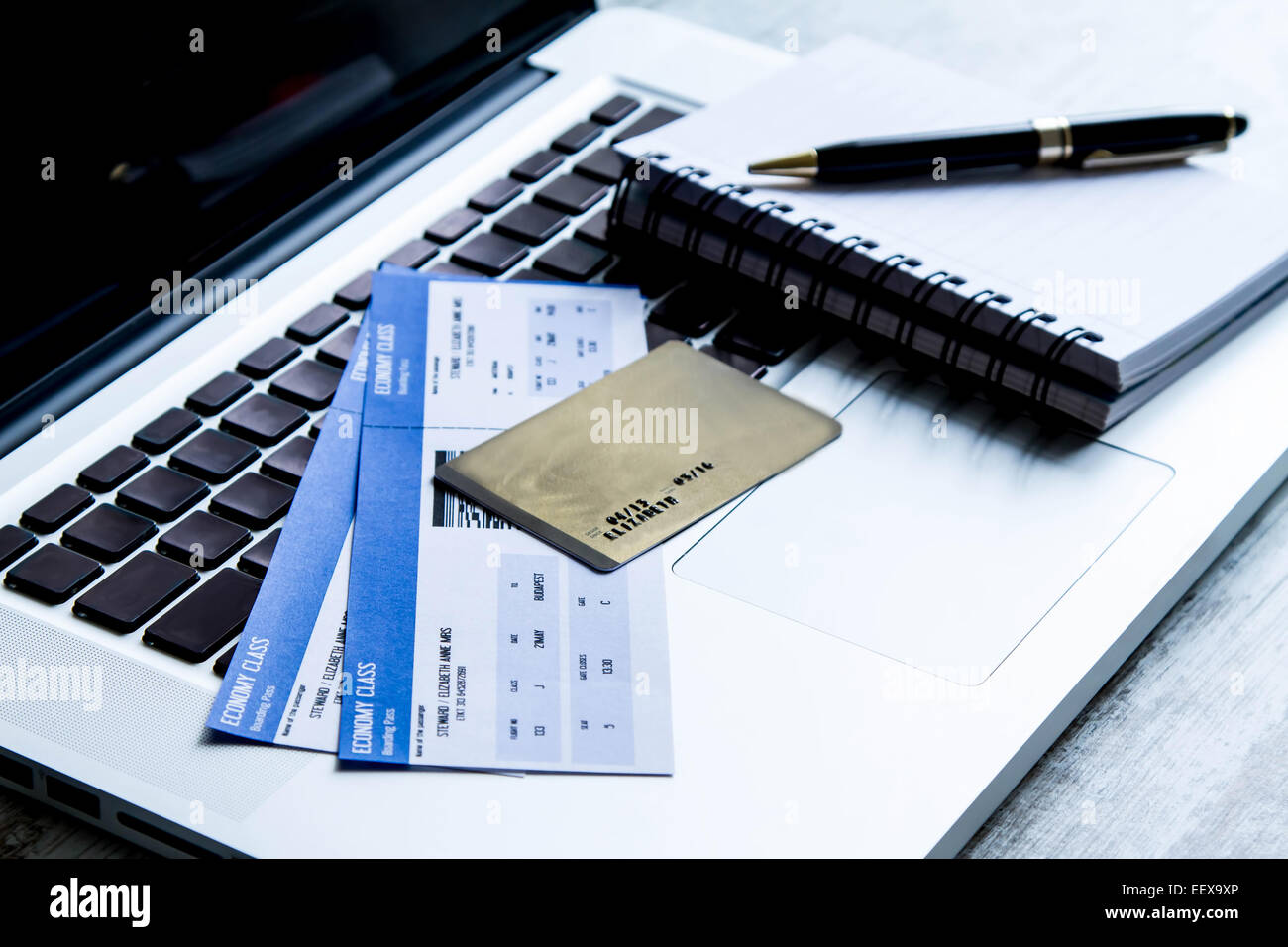 Buying airline tickets on line with a credit card Stock Photo - Alamy