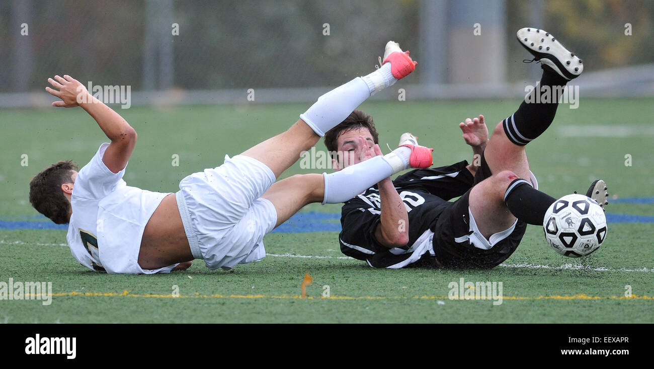 Notre Dame's Alex Ossa, left, and Xavier's Brendan Butler both hit the ...