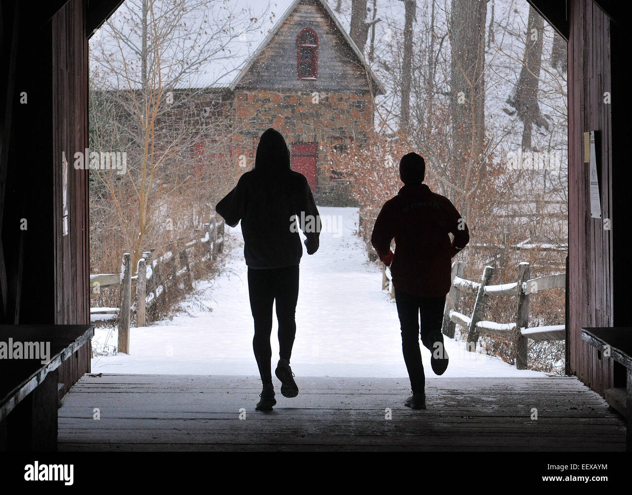 Runners run through the covered bridge at the Eli Whitney Museum during ...