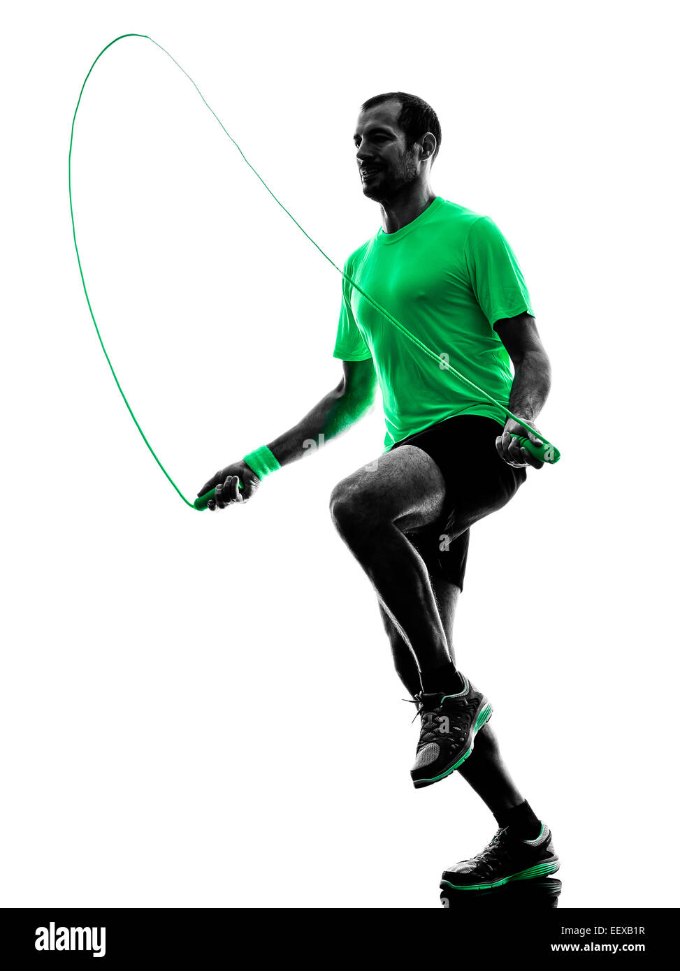 one man exercising jumping rope fitness in silhouette isolated on white ...
