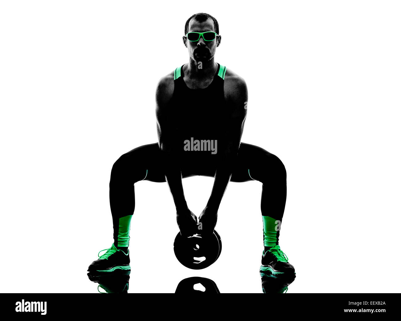 one man exercising weight disk fitness crossfit in silhouette isolated ...