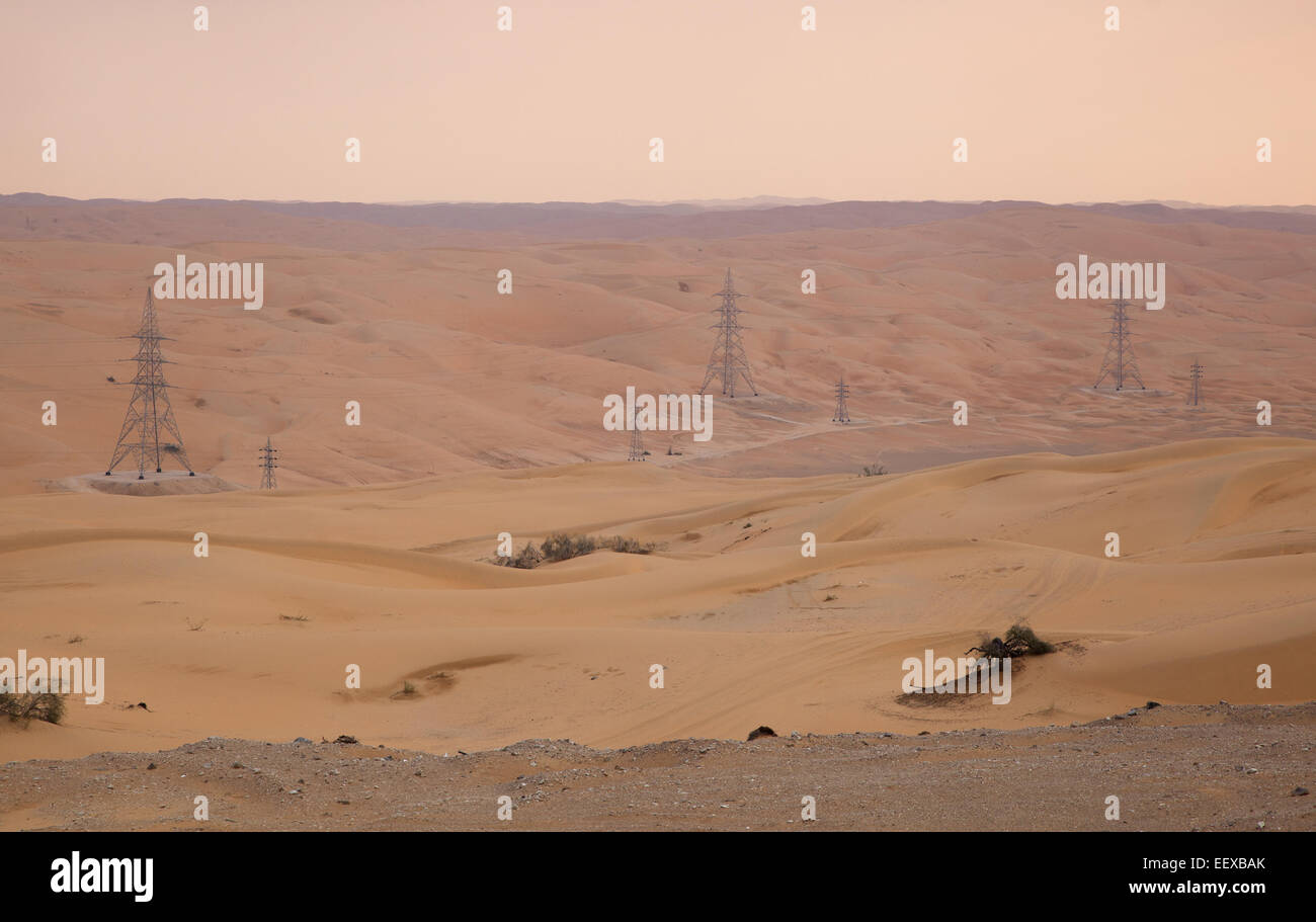Sand Desert, Arabian Peninsula. Power lines going through desert Stock ...