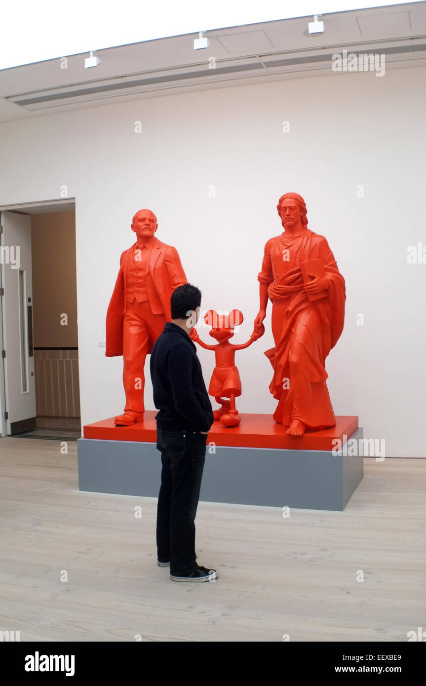 Visitor views the art work in a gallery Stock Photo - Alamy