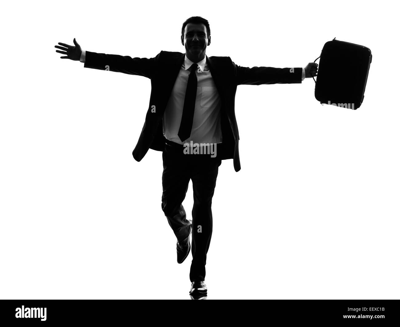 one caucasian business man running happy arms outstretched in ...