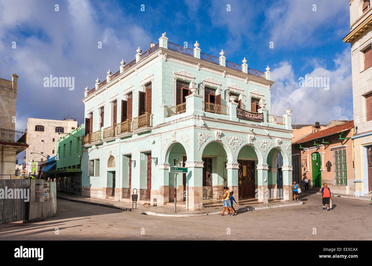 Urban landscape in Cuba: Attractive colonial style green building in ...