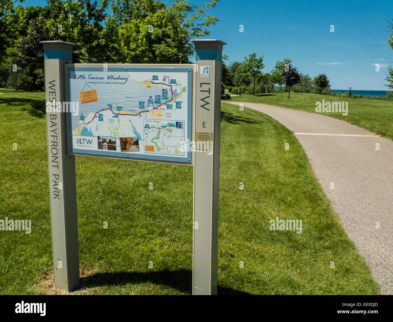 Trail sign for the Little Traverse Wheelway bicycle path along Lake ...