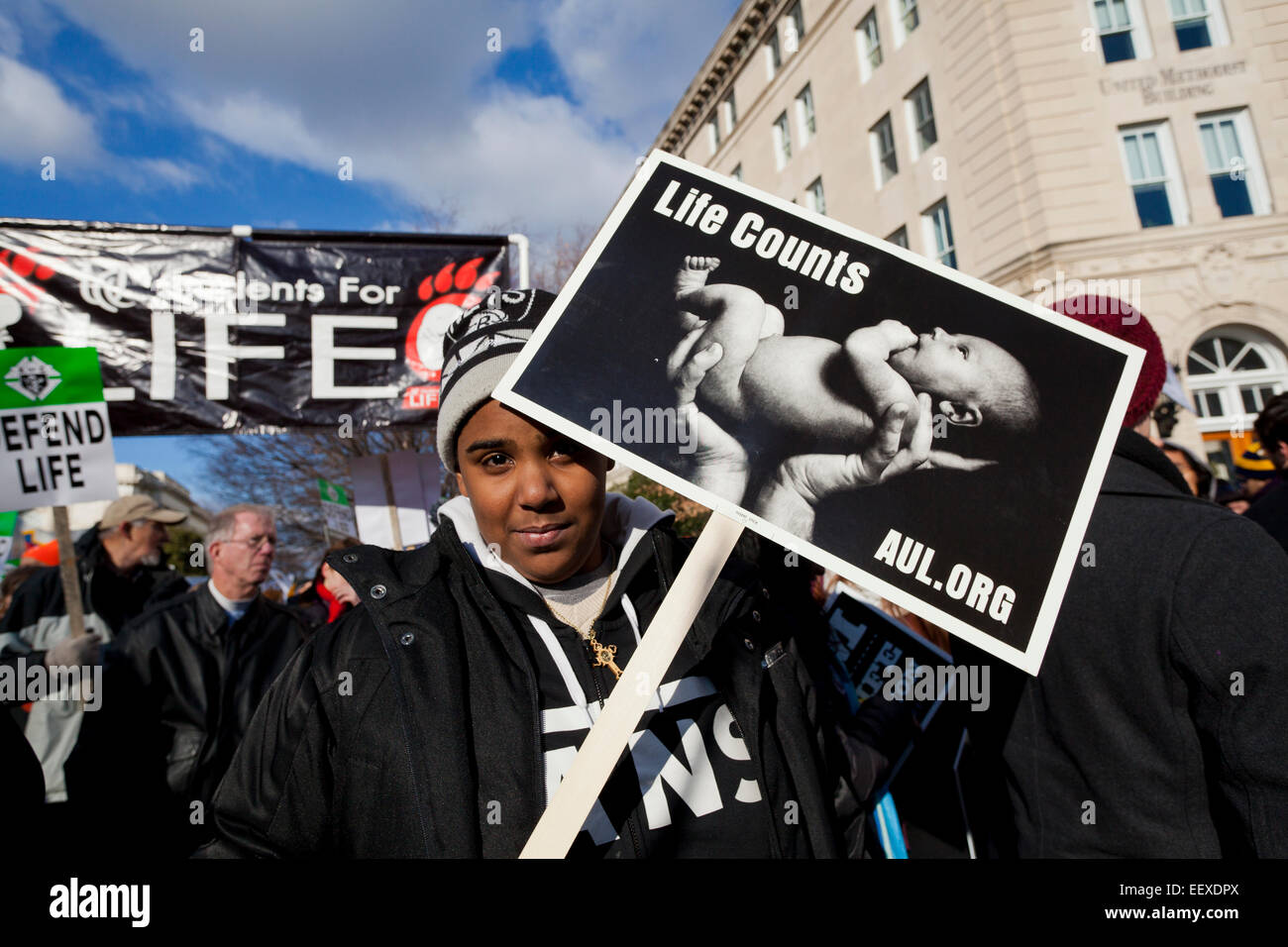 Carrying signs hi-res stock photography and images - Alamy