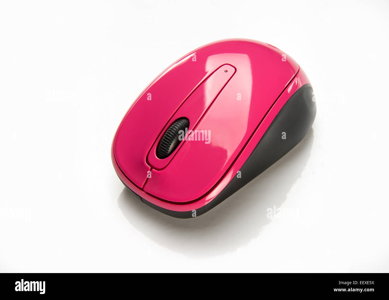 Small wireless pink mouse for portable laptop Stock Photo - Alamy