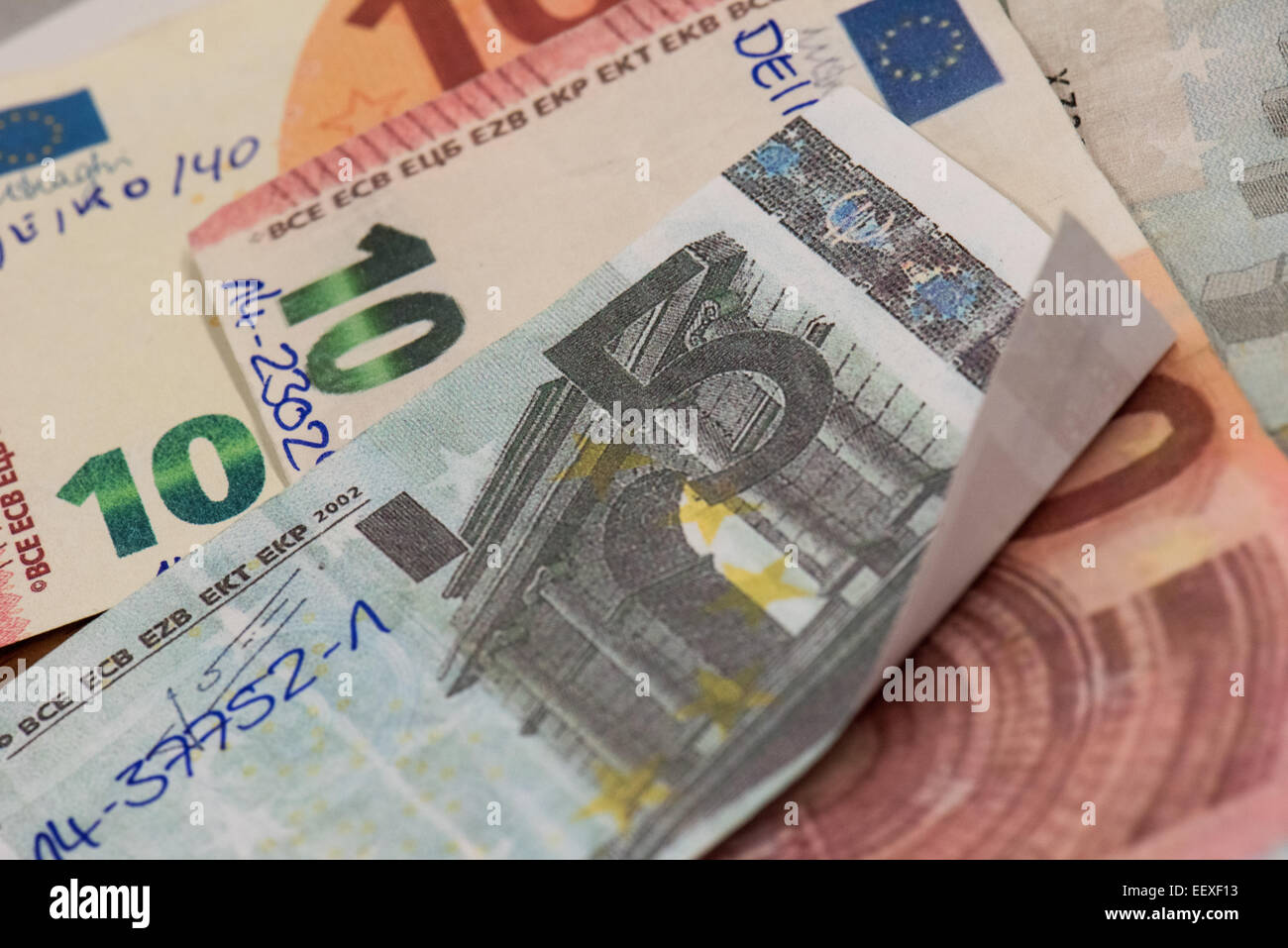 Frankfurt, Germany. 21st Jan, 2015. A counterfeit five euroe banknote ...