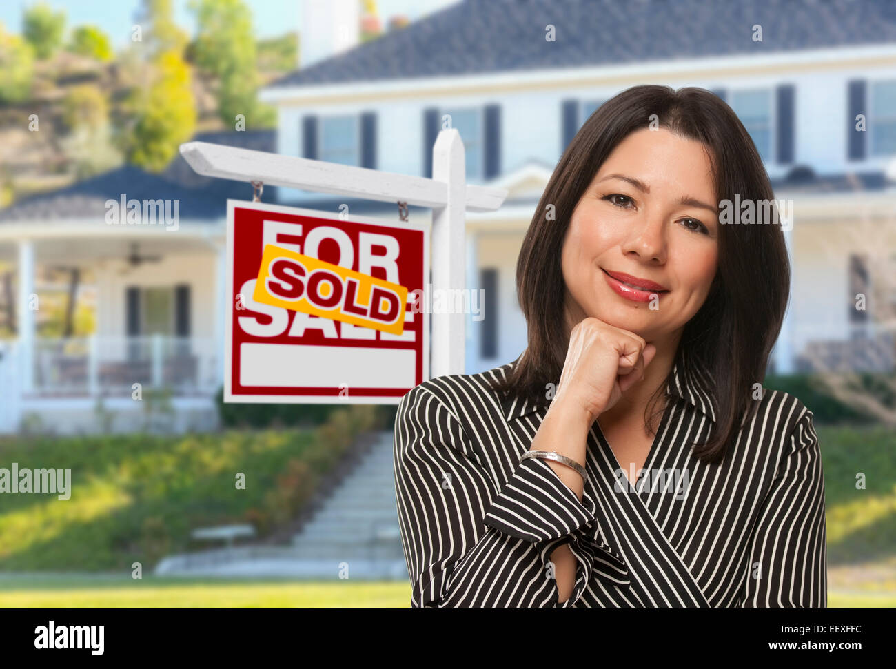 Proud, Attractive Hispanic Female Agent In Front of Sold For Sale Real ...