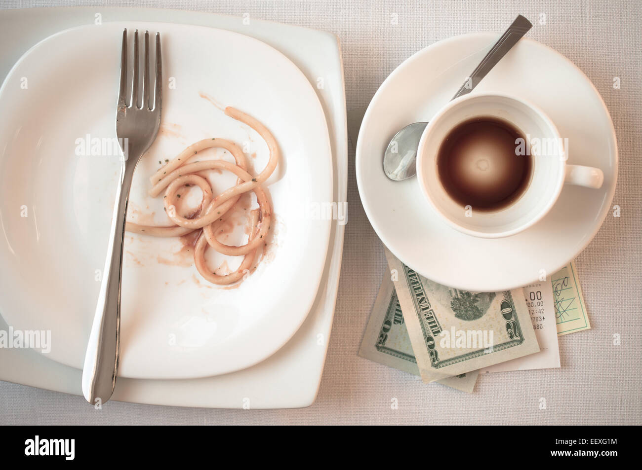 Restaurants check on the table after dinner and cash Stock Photo - Alamy