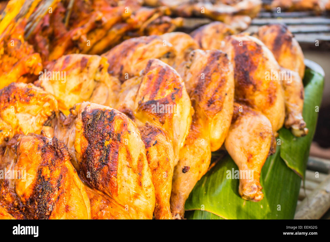 Grilled chicken on a plate in a restaurant Stock Photo - Alamy
