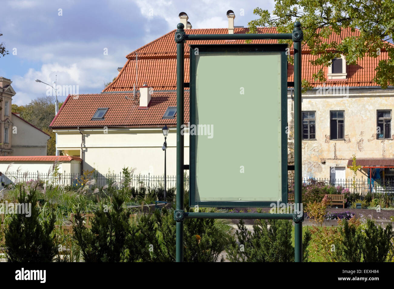 Retro style iron billboards in autumn city park. Sunny day. Mass ...