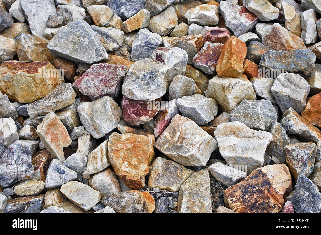 Rough big granite boulders stones heap background Stock Photo - Alamy