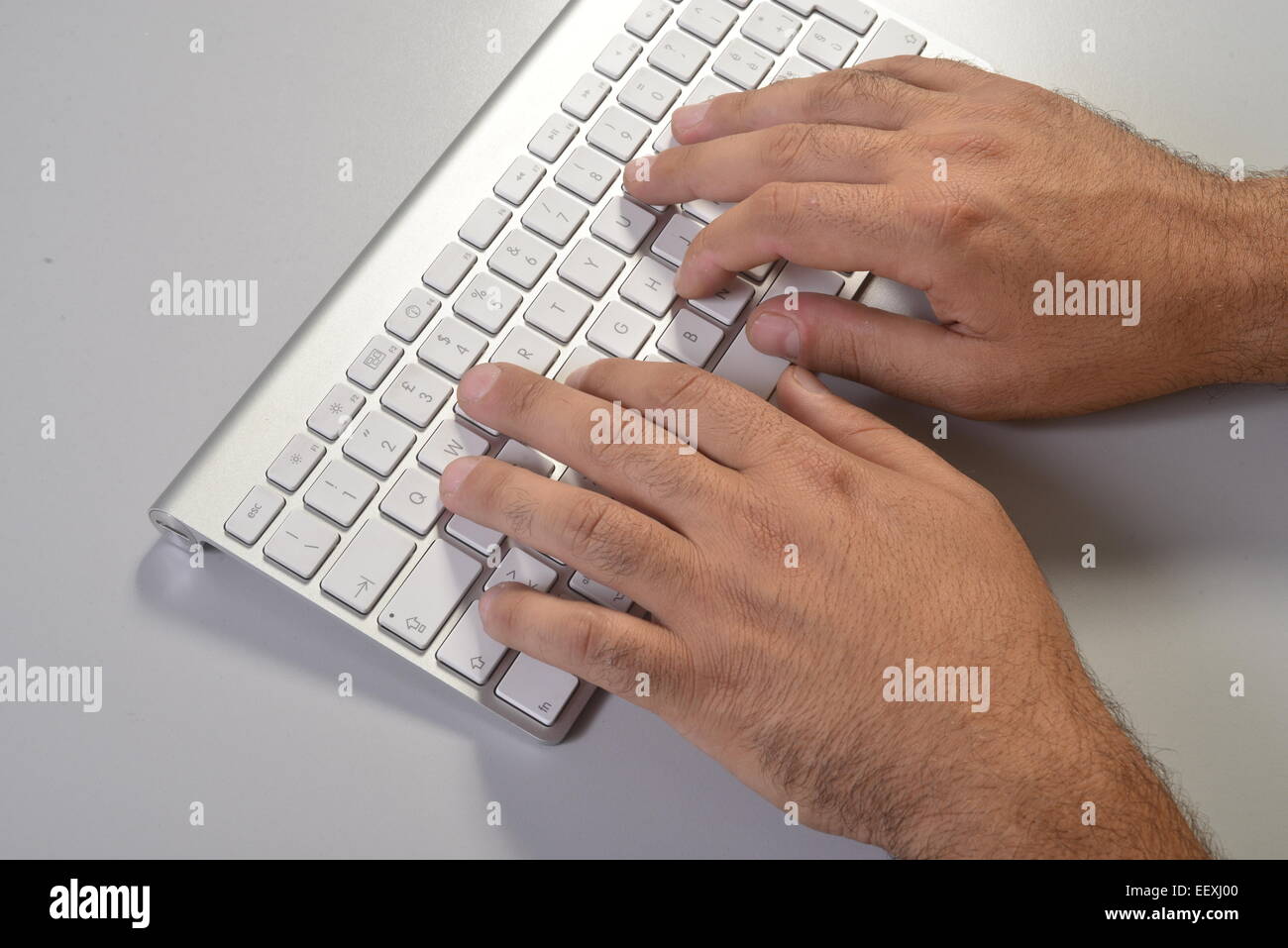 Human hand typing hi-res stock photography and images - Alamy