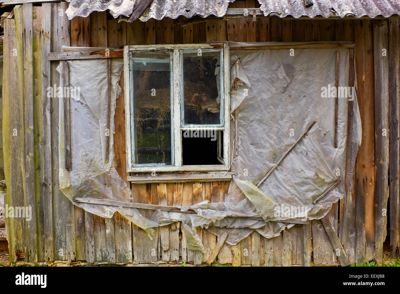 Rotten window of the European slums closeup background Stock Photo - Alamy