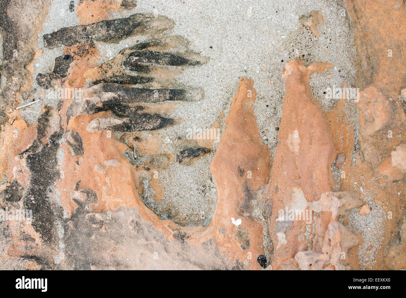 Abstract decorative sand and rocks in red and black Stock Photo - Alamy