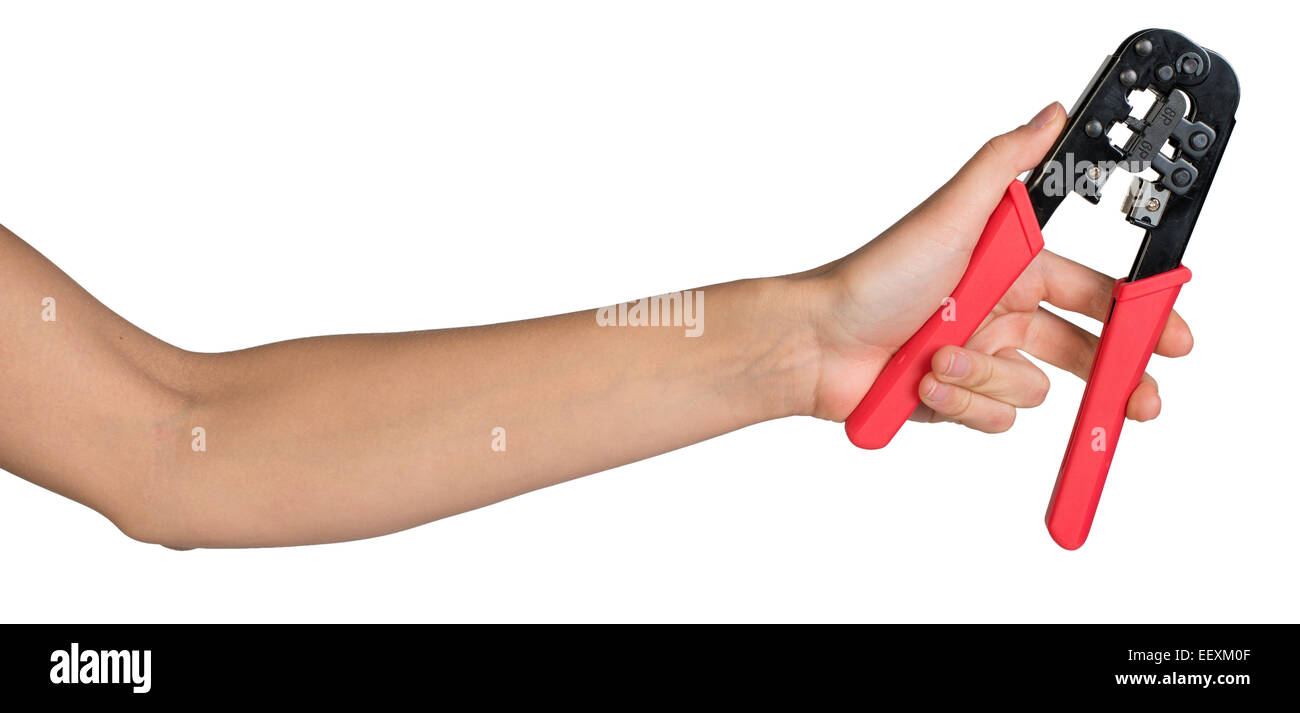Female hand holding crimping pliers Stock Photo - Alamy