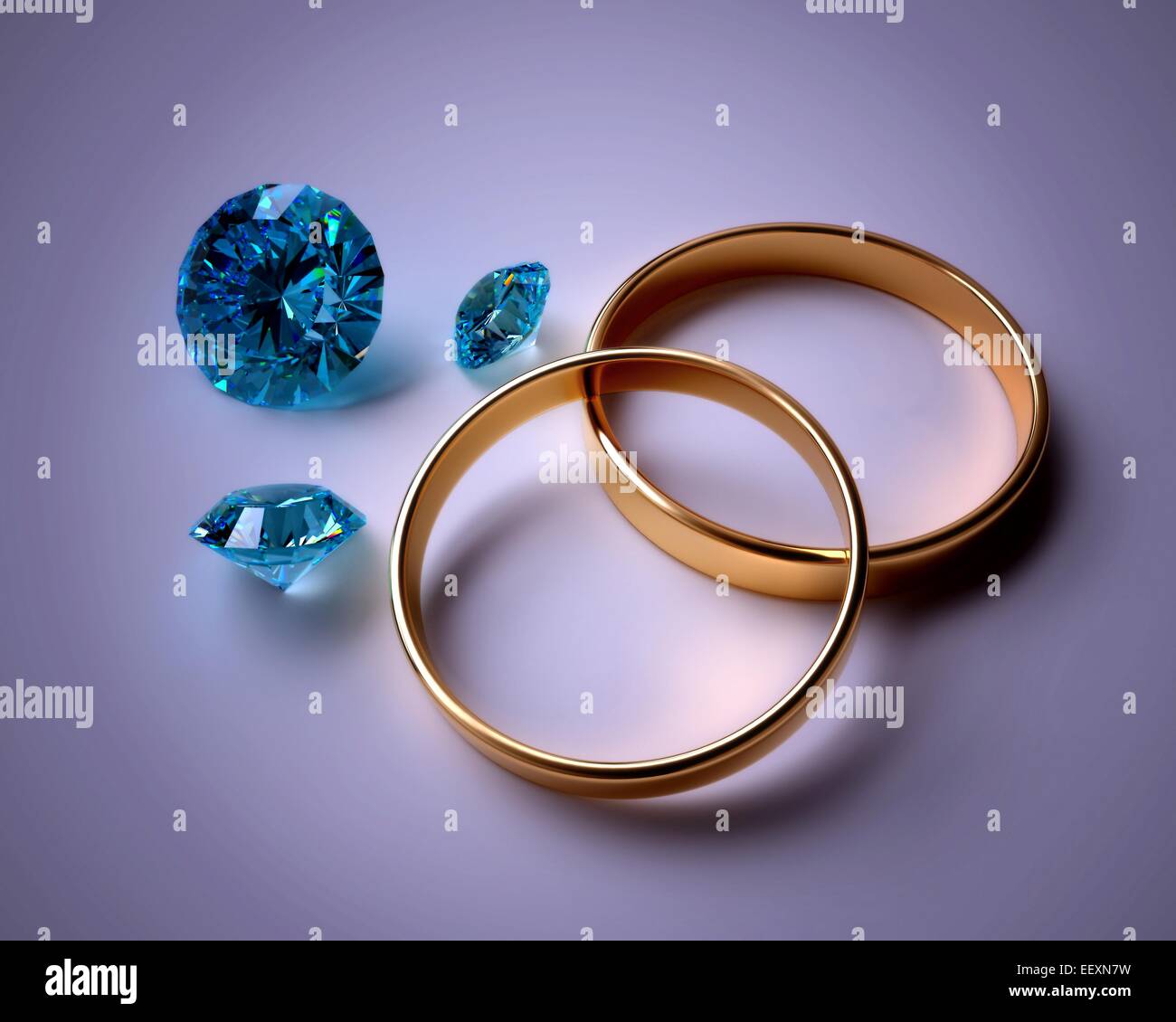 wedding rings and blue gems Stock Photo - Alamy
