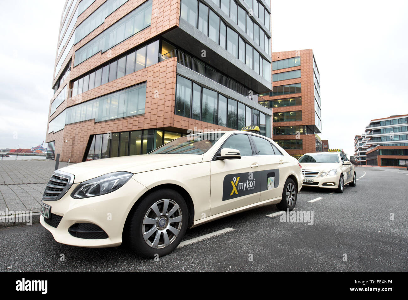 Hamburg, Germany. 14th Jan, 2015. Two cabs labels with the logo of taxi ...