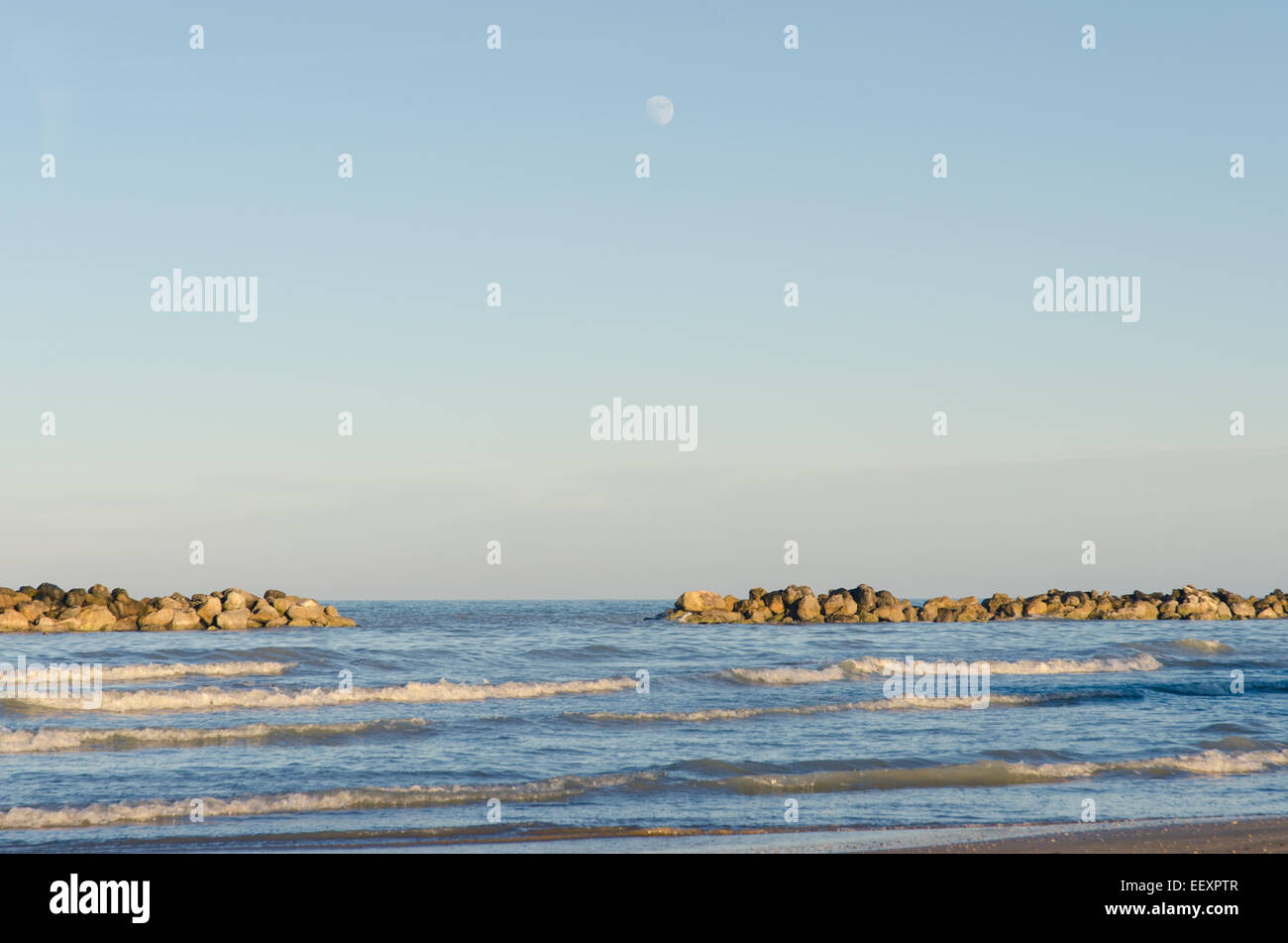 An incredible moon rise over the sea in Italy Stock Photo - Alamy