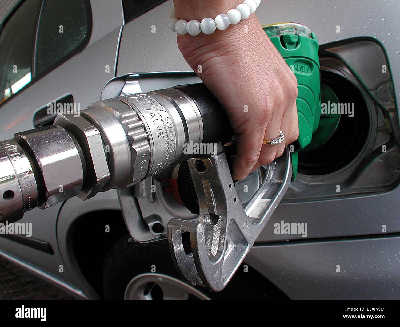 Motoring nozzle oil station hi-res stock photography and images - Alamy