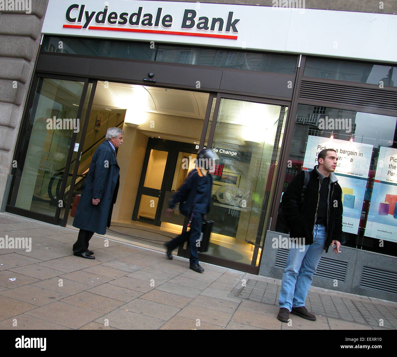 Clydesdale Bank with security guard leaving bank Piccadilly Circus ...