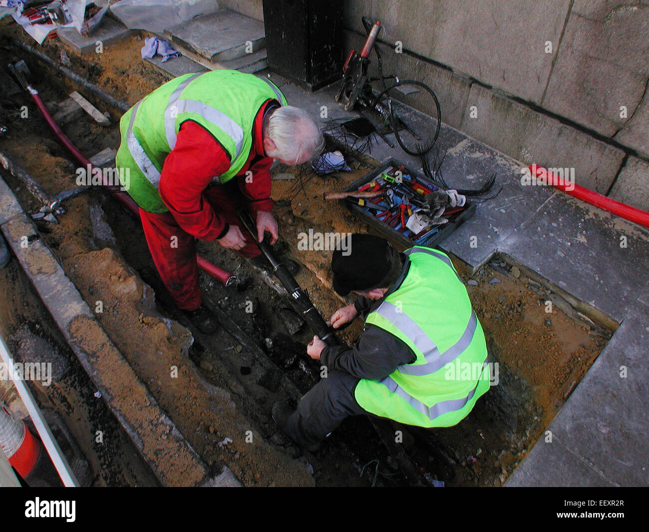cable layers telecommunication fitters men working on telecom cables ...