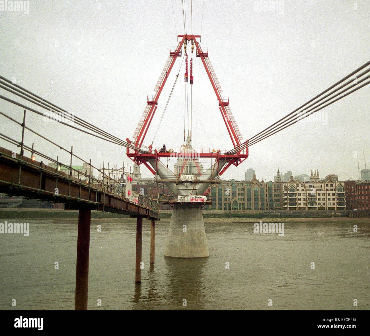 Building the Millennium Bridge With St Pauls in background. The ...
