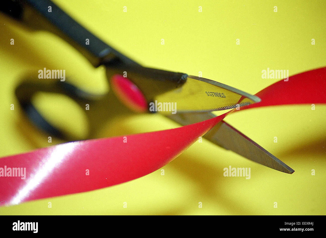 Cut through red tape hi-res stock photography and images - Alamy