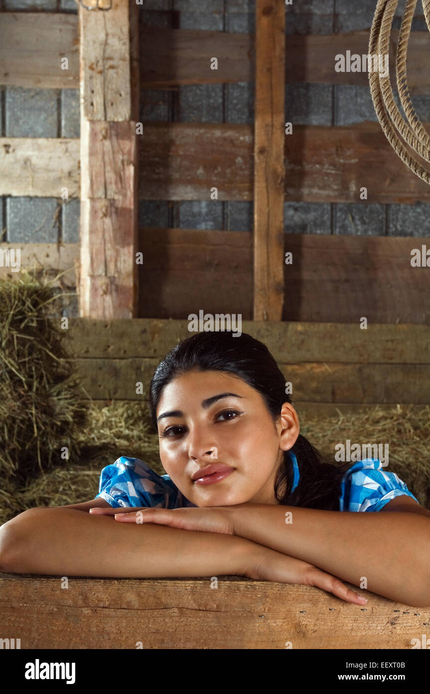 Woman in a stable Stock Photo - Alamy