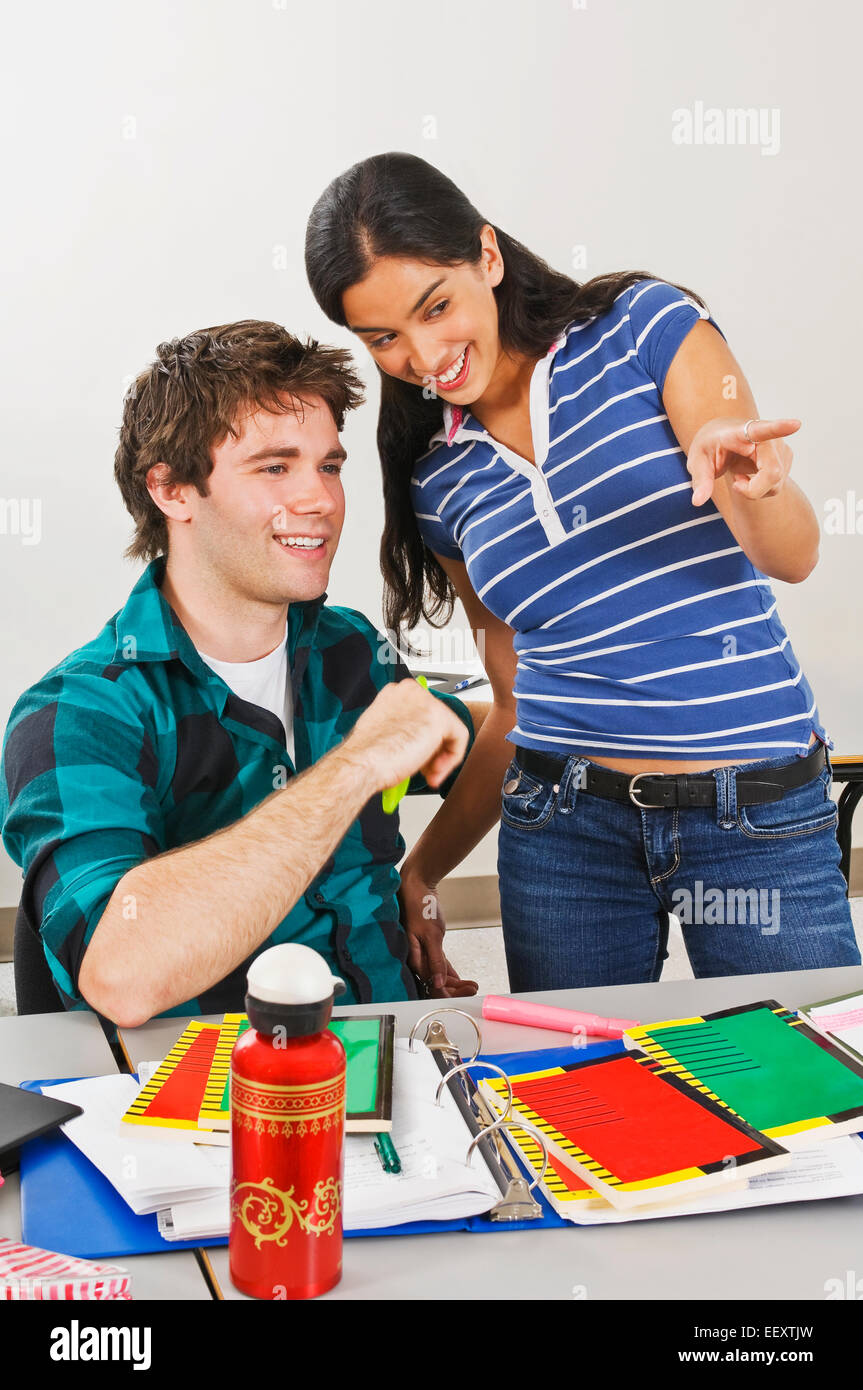 Two students in a classroom Stock Photo - Alamy