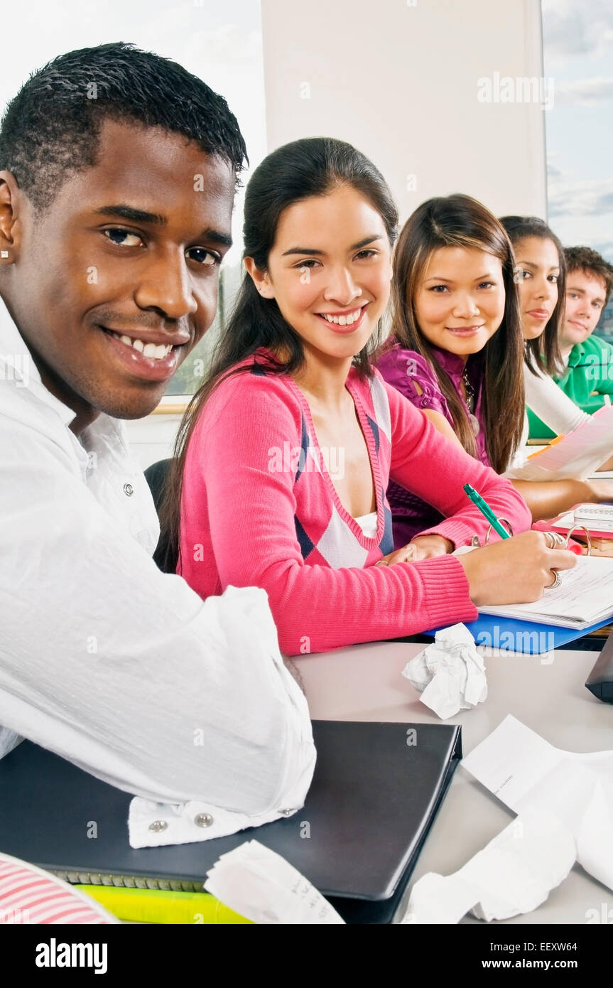 Students in a classroom with a laptop Stock Photo - Alamy