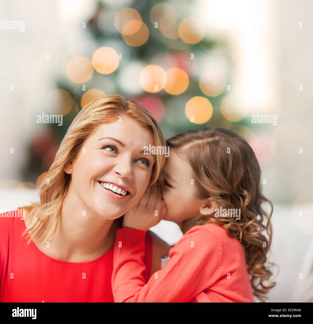 mother and daughter whispering gossip Stock Photo - Alamy