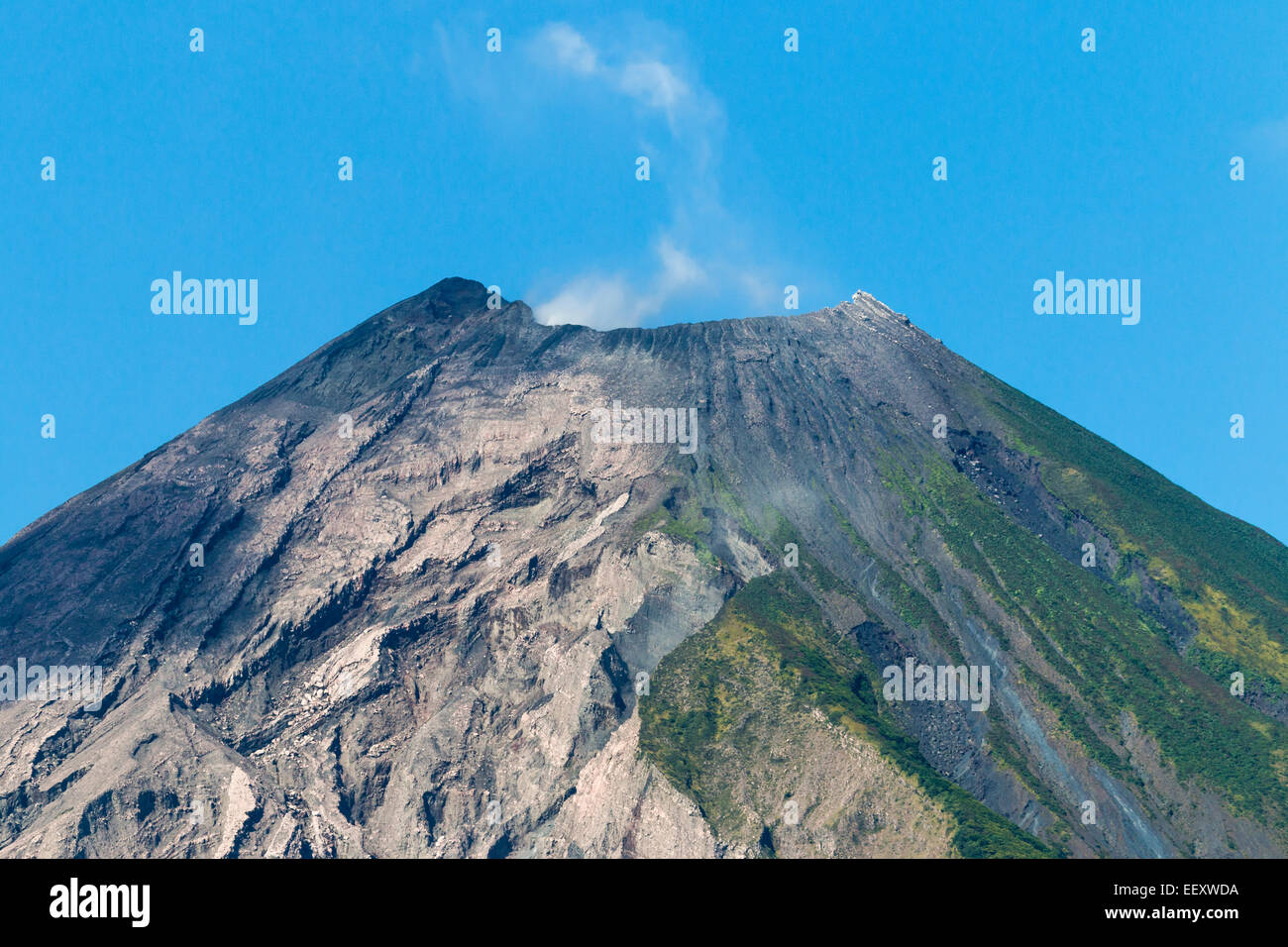 Smoking peak of active Volcan Concepcion bigger of 2 volcanoes that ...