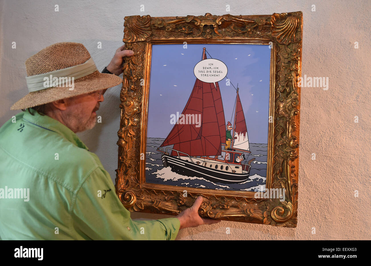 Cartoonist Fred Toedter, also known as Tetsche, places one his cartoons ...